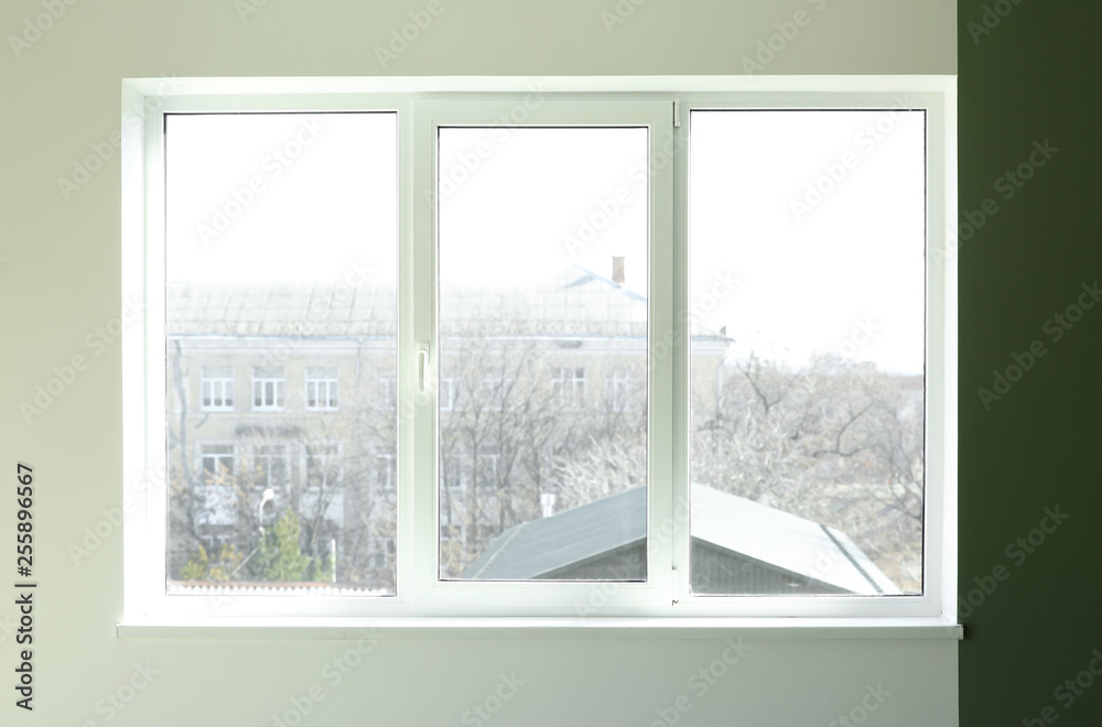 Big modern metal-plastic window in flat Stock Photo | Adobe Stock