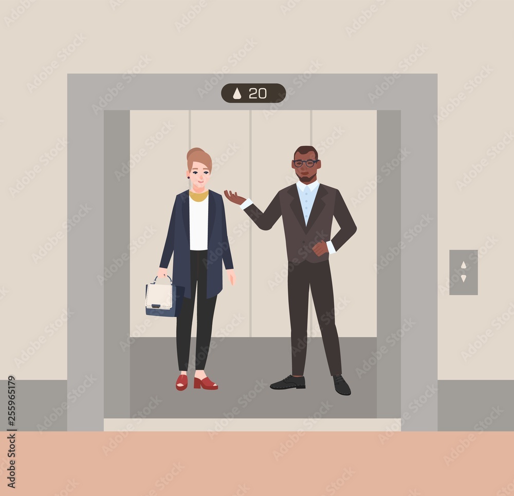 Smiling male and female office workers or clerks standing in elevator ...