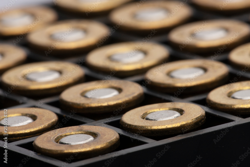 Pile of pistol bullets. The concept of limiting the spread of small ...