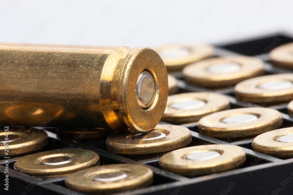 Pile of pistol bullets. The concept of limiting the spread of small ...
