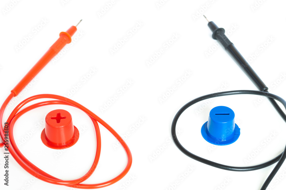 the red and black probes of the multimeter and the signs of polarity of ...