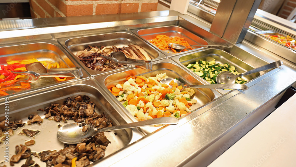 restaurant with many raw and cooked foods Stock Photo | Adobe Stock