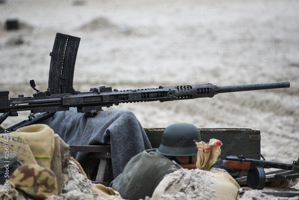 Barrel of a machine gun from WWII during the reconstruction of the ...