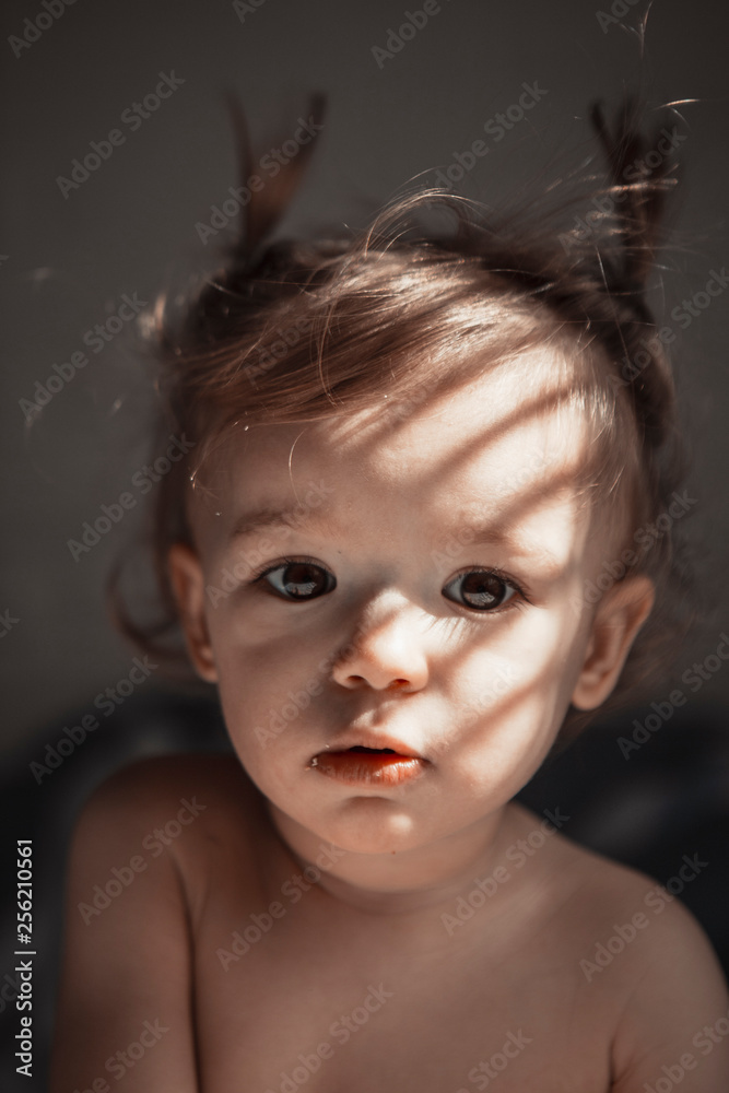 child with tails on his head favors morning in bed in his parents' room ...