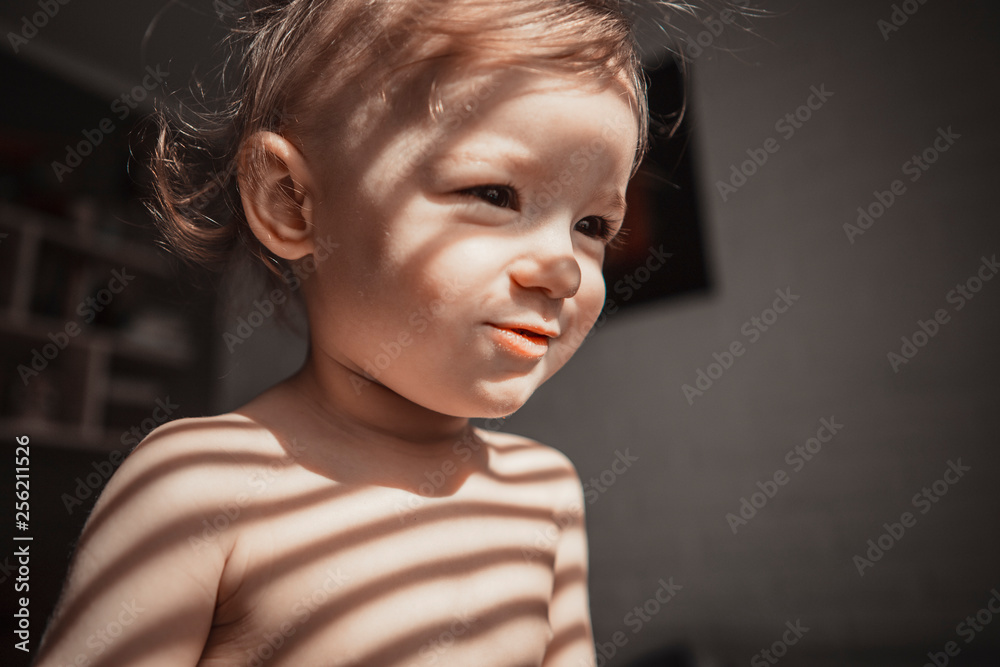 child with tails on his head favors morning in bed in his parents' room ...