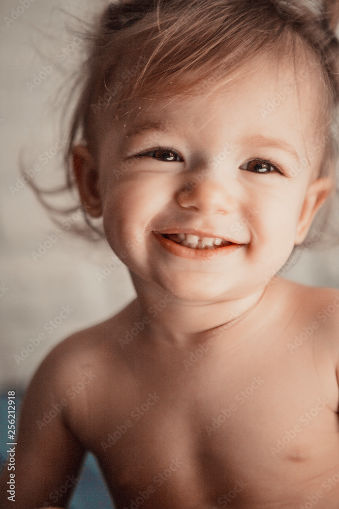 child with tails on his head favors morning in bed in his parents' room ...