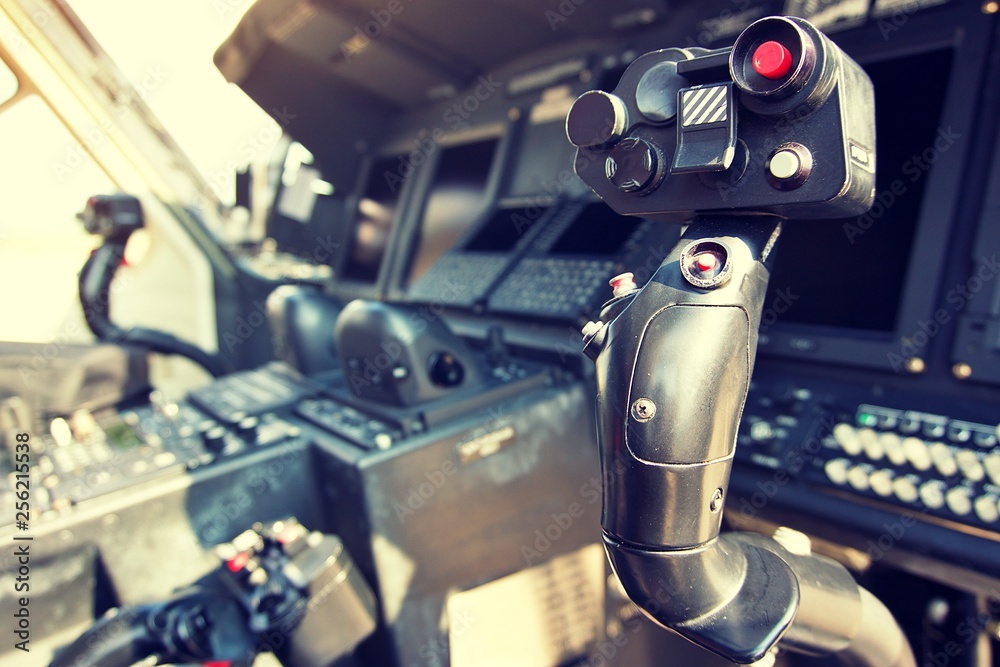 Helicopter flight control. Cyclic of helicopter. Helicopter s76 cockpit. Close up flight control ...