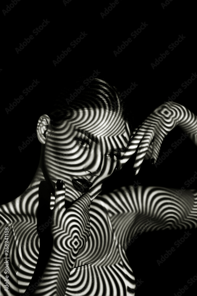 Black and white portrait of a beautiful young girl with a shadow ...