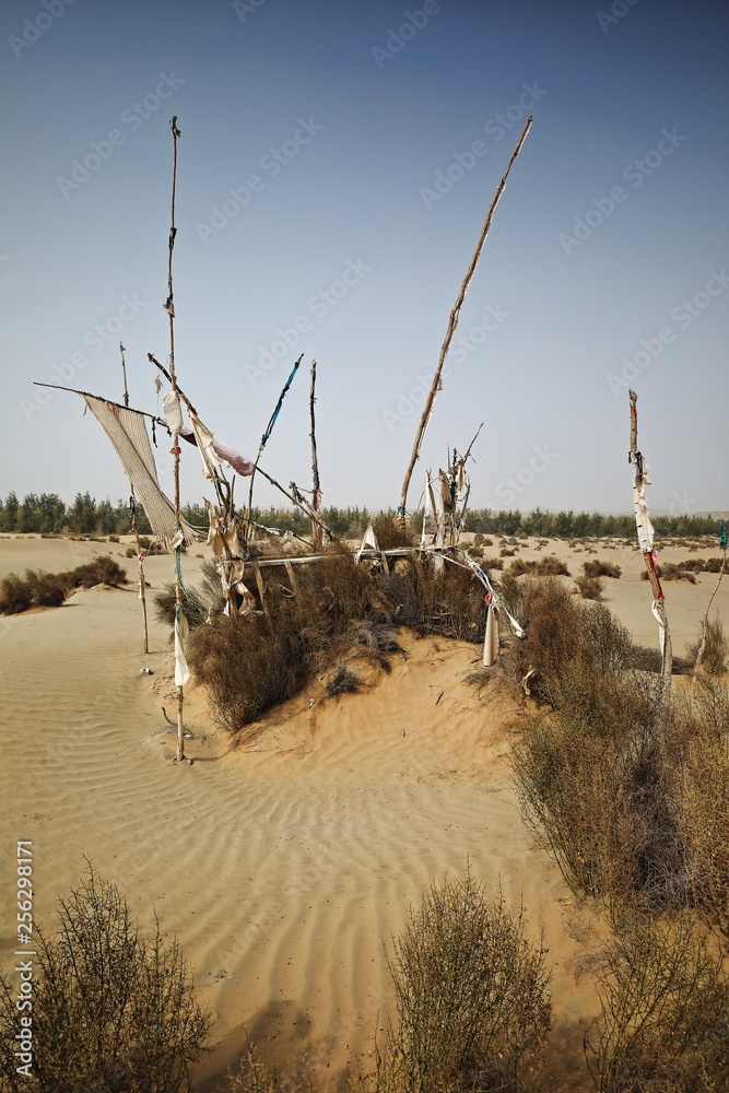 Votive flags-burial mound-Imam Asim's mazar or mausoleum area ...