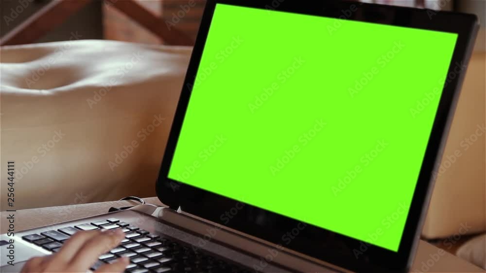 Video Stock Laptop with Green Screen. You can replace green screen with ...