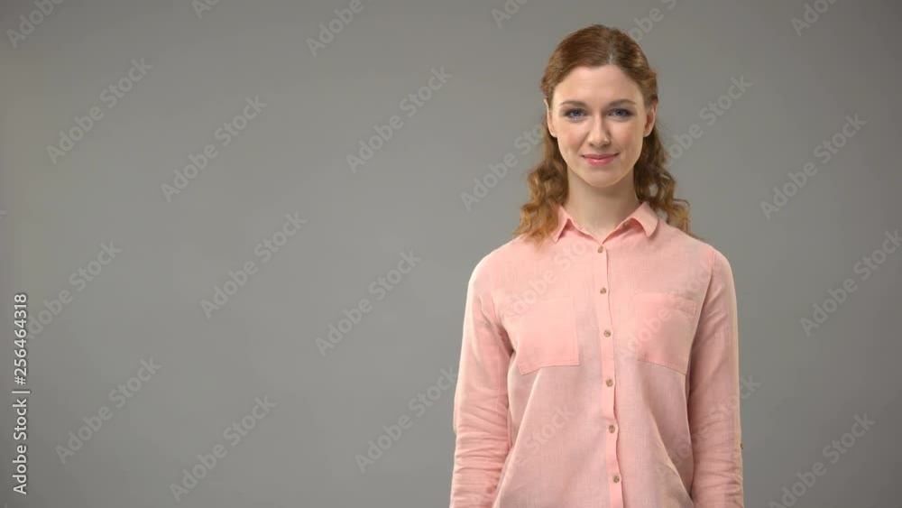 Deaf female asking again please in sign language, teacher showing words ...