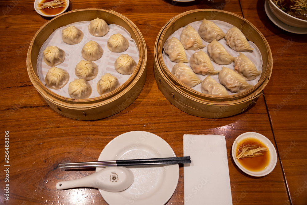 Chinese steamed steamed bun ( baozi ) named Xiaolongbao also called a ...