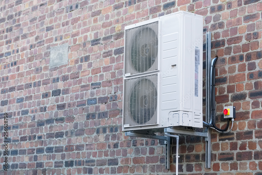 Condenser unit for air conditioning system wall mounted outdoors Stock ...