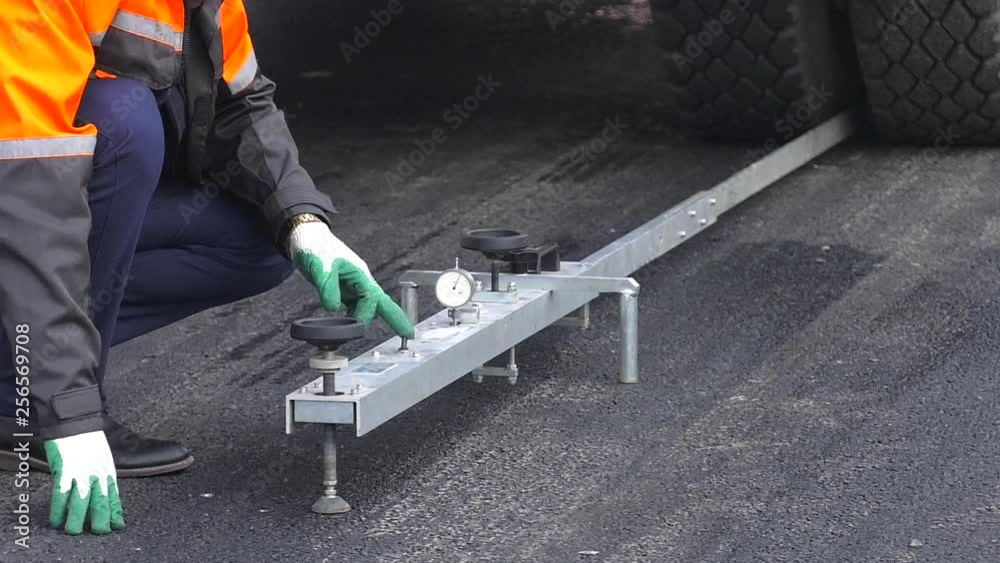 Inspection and testing of asphalt concrete pavement. A road ...