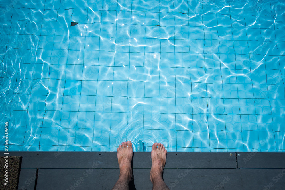 View From Above on Bare Male feet at Swimming Pool Side. Barefoot on ...
