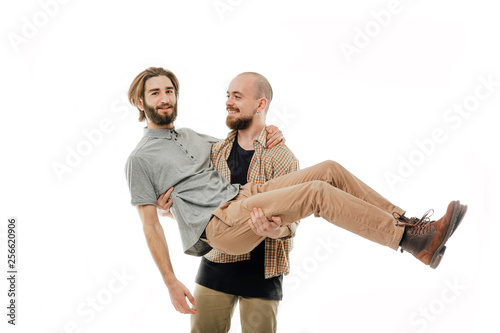 Man holding man in his hands, arms, carrying a man in his hands. gay ...