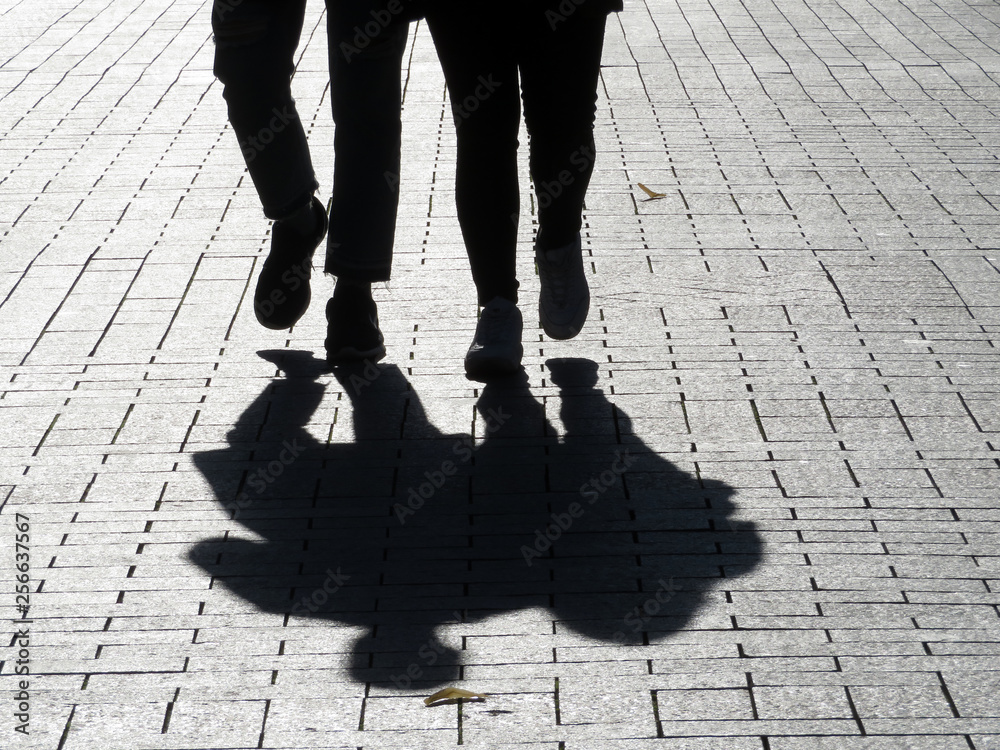 Two People Playing Shadow