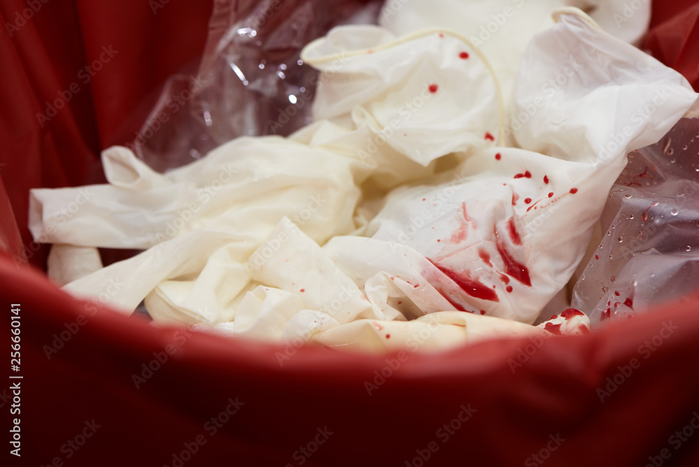 Surgical garbage bin stained with blood in operating room Stock Photo ...