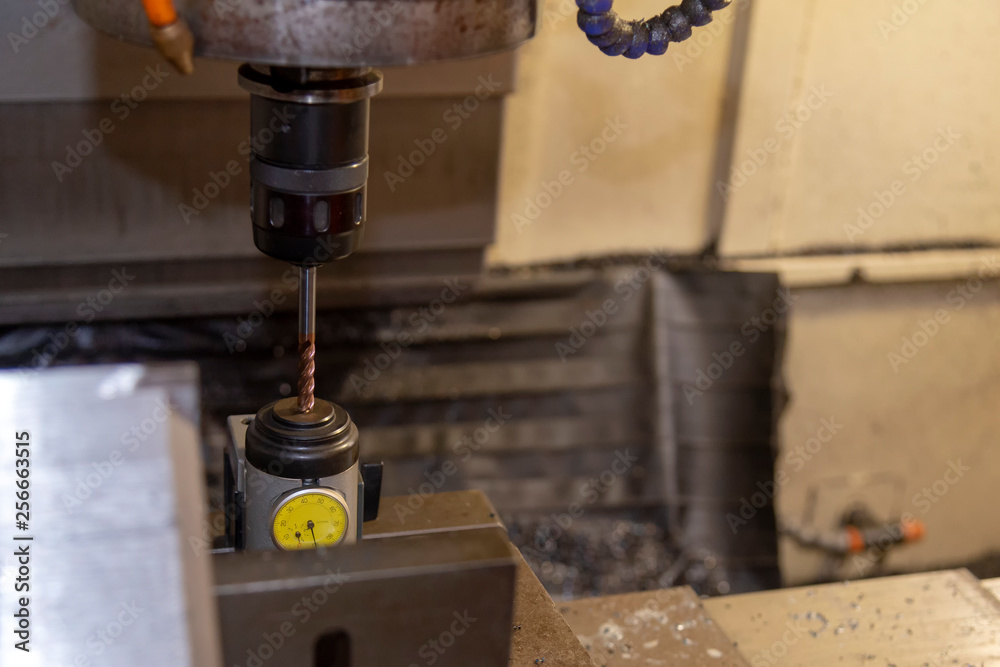 The tool length offset measurement process on CNC milling machine.The ...