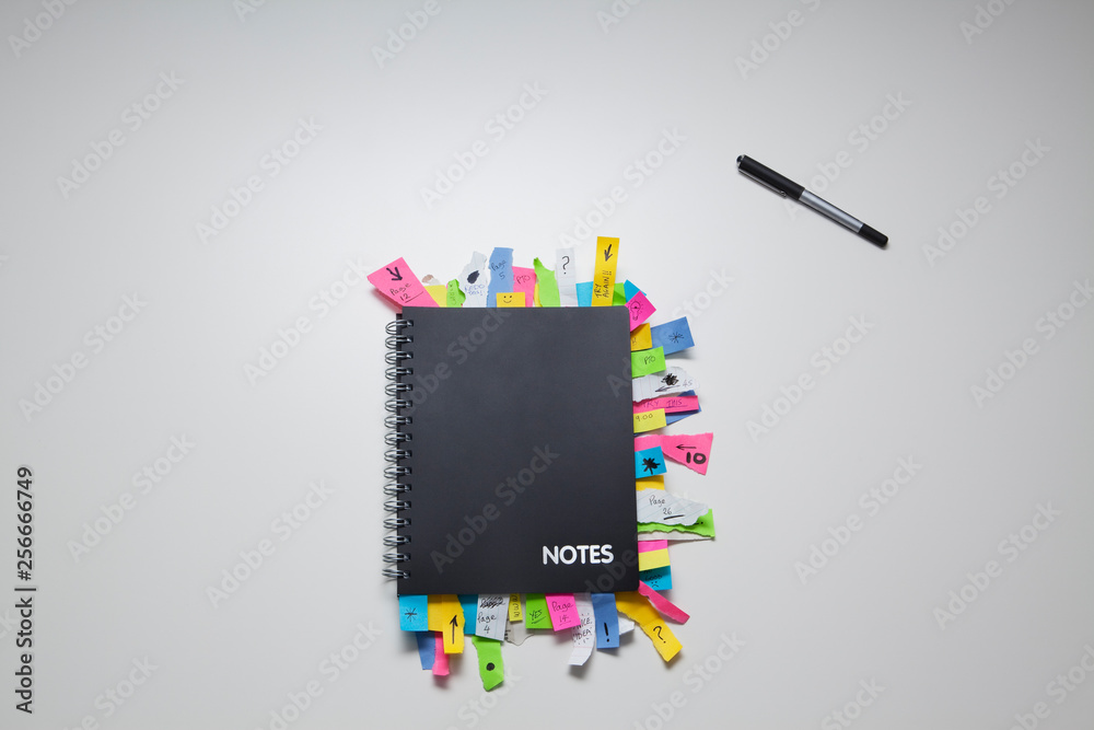 Note pad full of post it notes Stock Photo | Adobe Stock