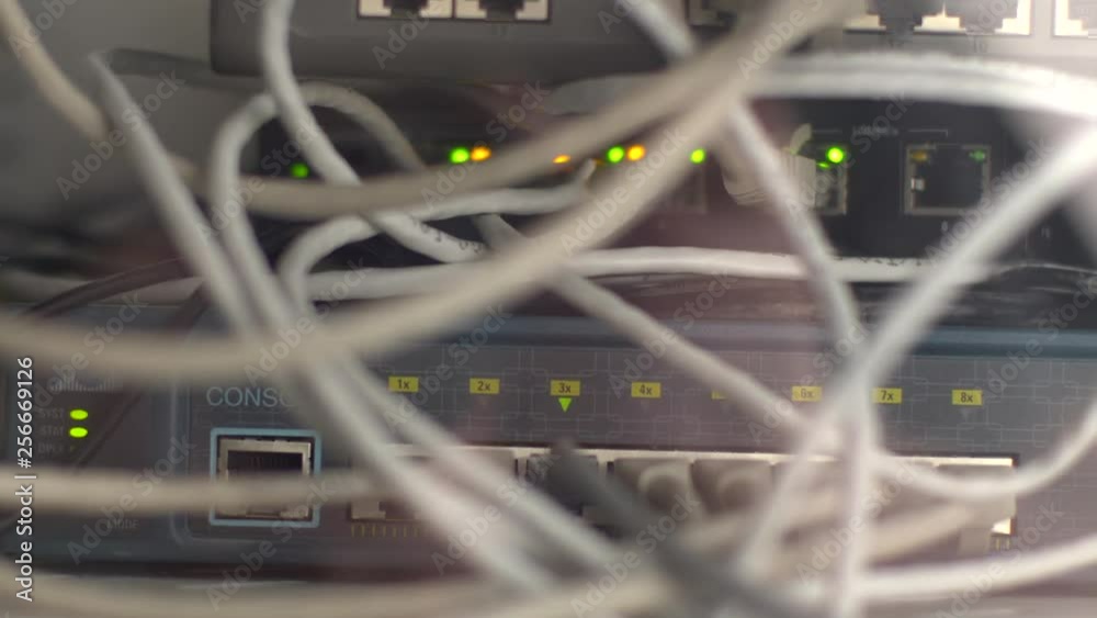 Modem Fiber Optic cables connected to an optic ports and Network cable ...