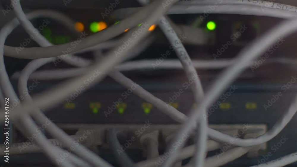 Modem Fiber Optic cables connected to an optic ports and Network cable ...