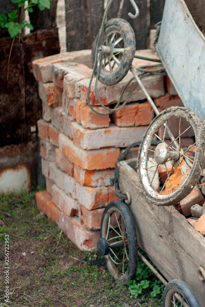 Garden wheelbarrow for transporting bricks with his own hands. Two a ...