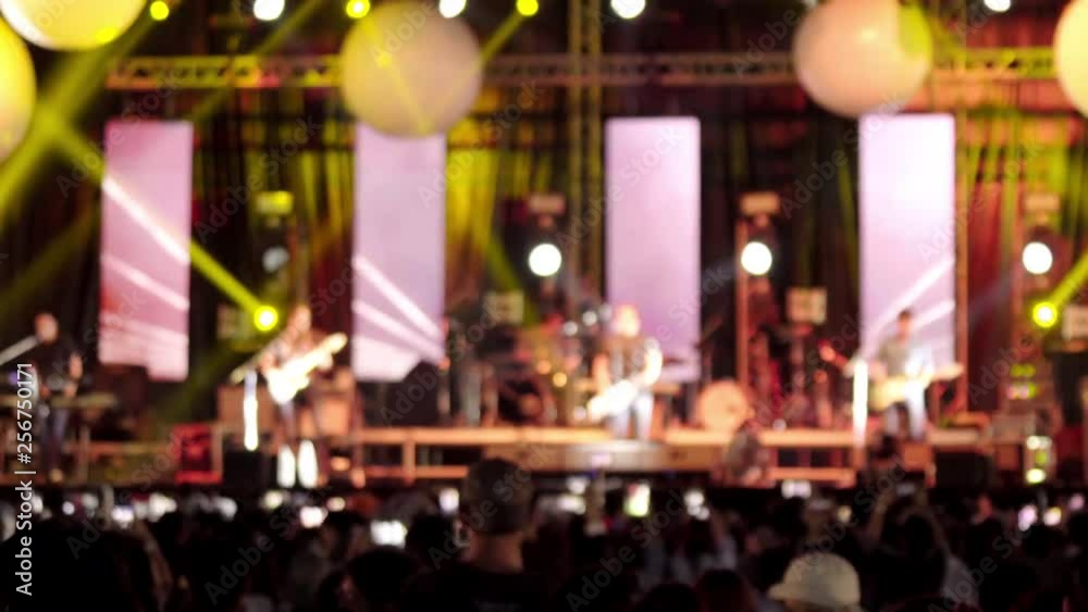 4K Video blurred rock music star singer in concert with yellow and red ...