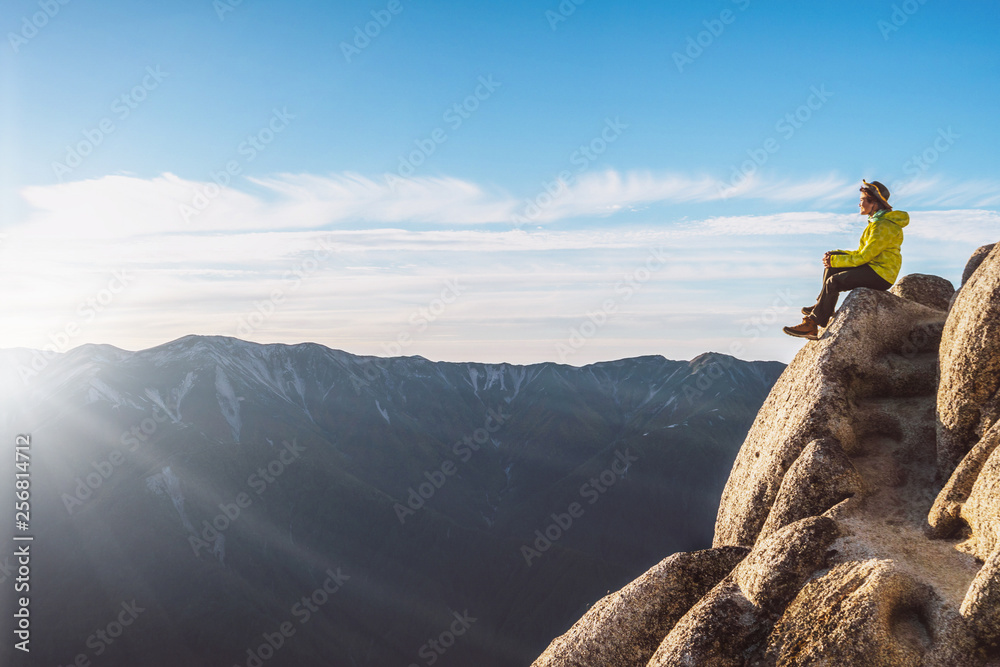 Epic adventure of brave and ambitious hiker trekking activity on wild ...