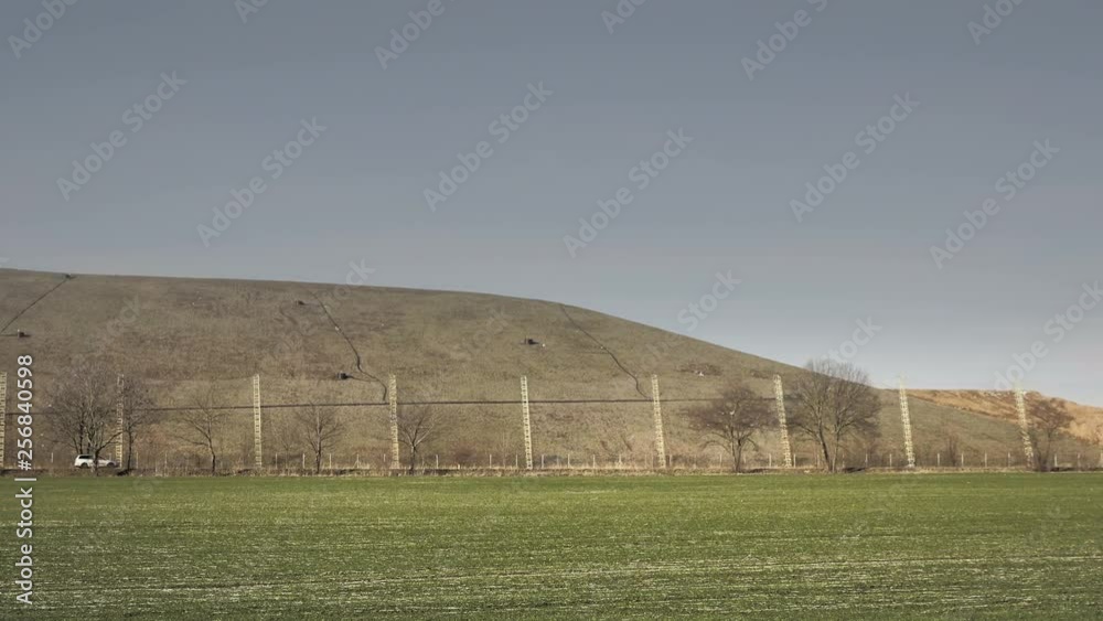 Garbage dump, landfill of municipal waste with protective net on steel ...