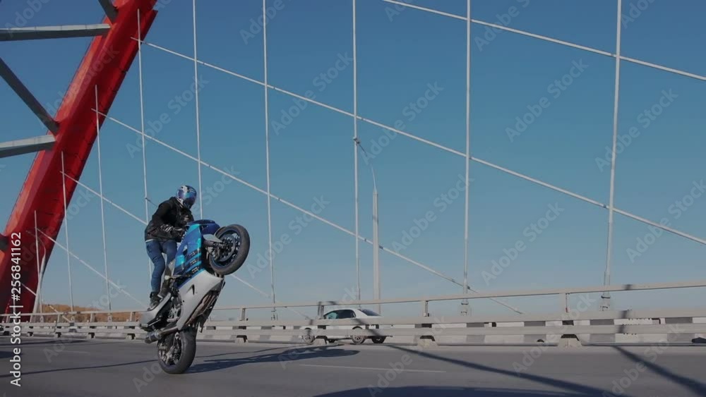 Professional driver risking life, perform dangerous tricks on the back ...
