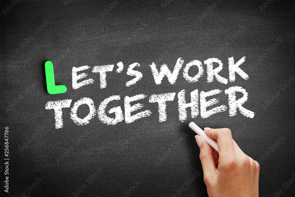 Let's Work Together text on blackboard, business concept background ...