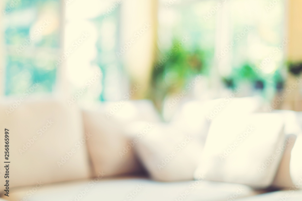 Blurred home interior background with couch and natural light Stock ...