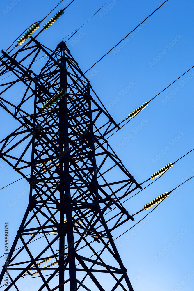 Foto de High voltage electricity pylon and transmission power line on ...