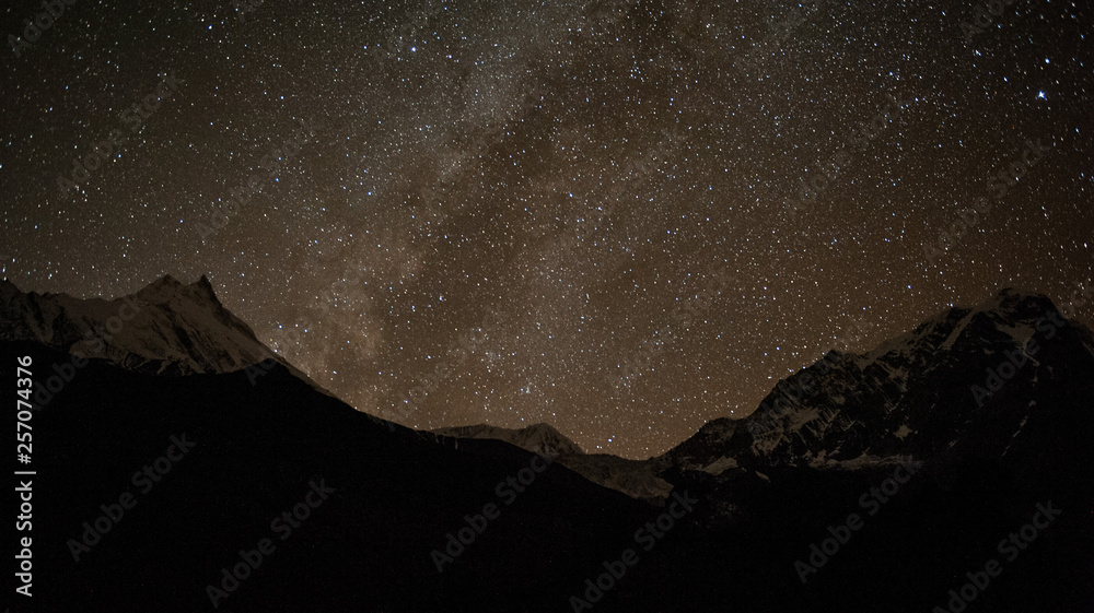 Sky full of stars and Milky Way. Nightime scene with himalayan ...
