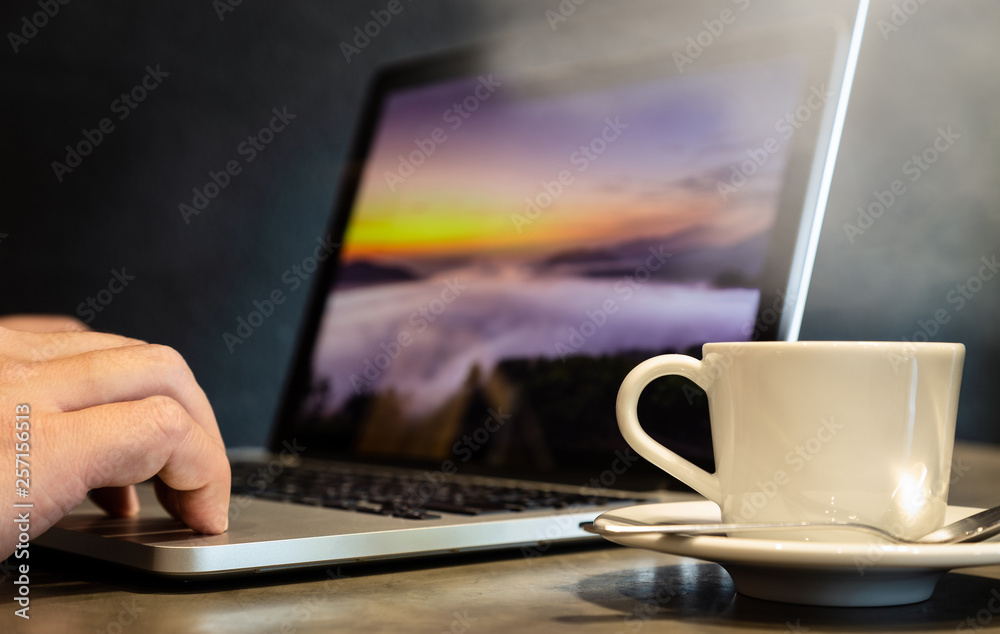 Espresso coffee in a cup with hot steam and smoke,man hands is working ...