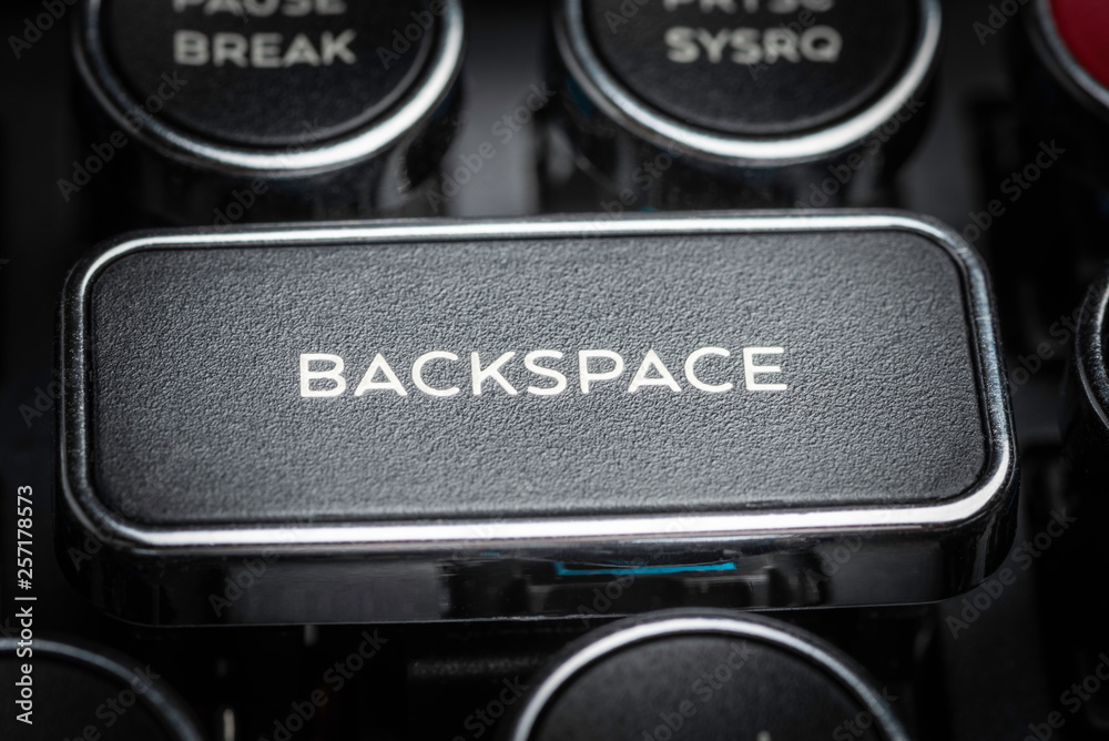 An extreme close-up or macro shot of a rectangular BACKSPACE key on a ...
