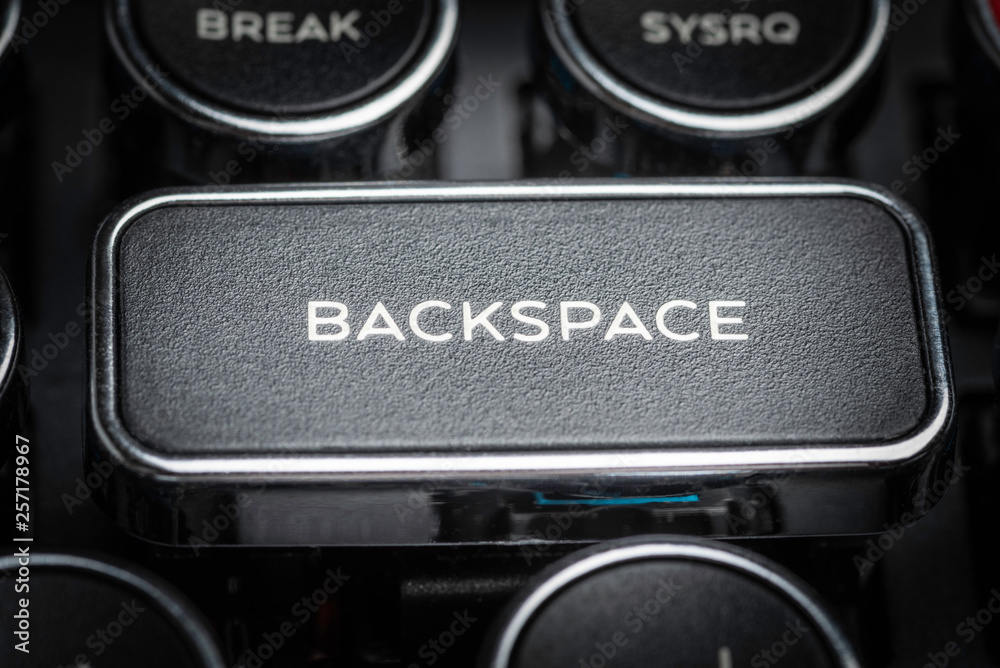 An extreme close-up or macro shot of a rectangular BACKSPACE key on a ...
