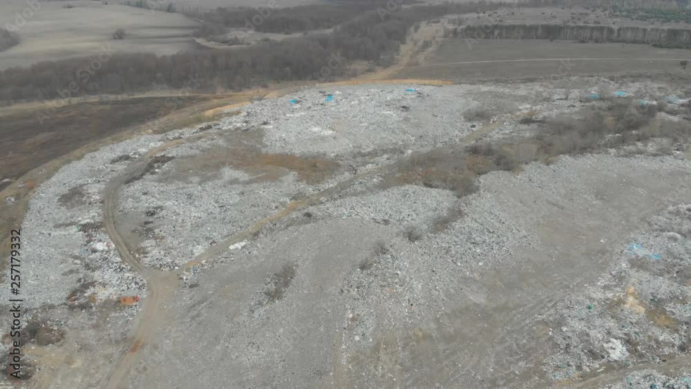 A large landfill of garbage and household waste is polluting the ...