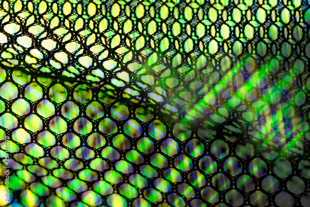 Artistic detail of wavy netting with light rays. Abstract mesh texture ...