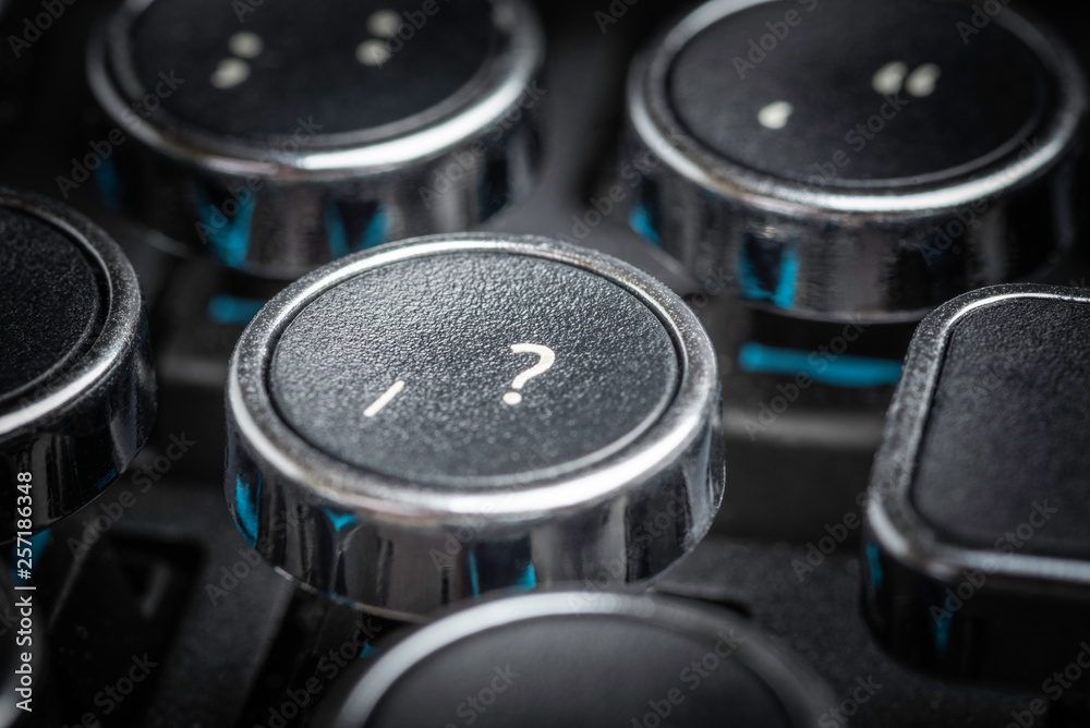 An extreme close-up or macro shot of a round slash and question mark ...