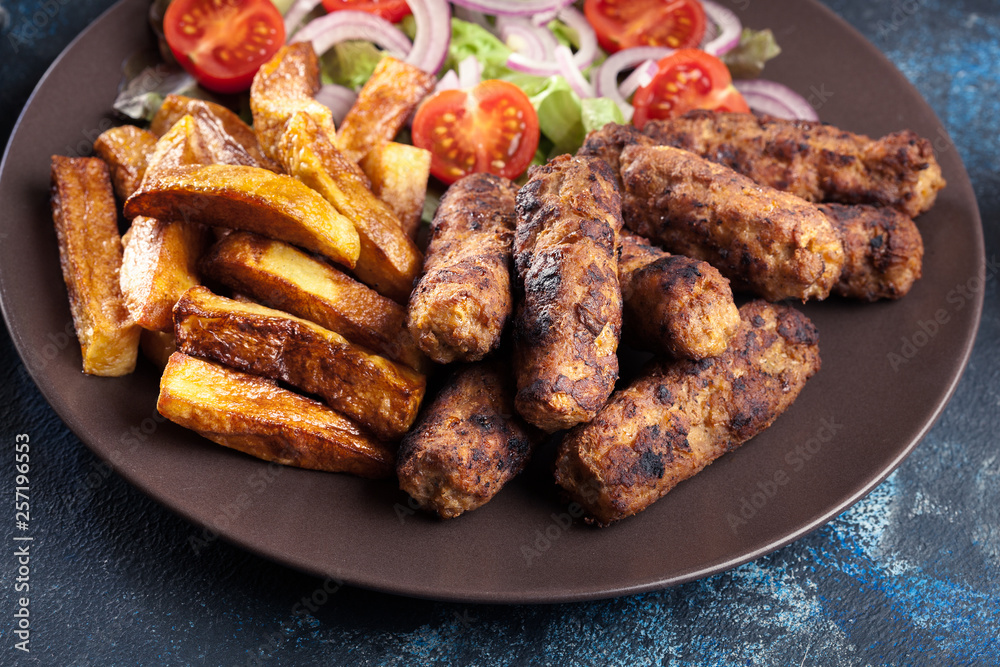 Kebapche or cevapcici, balkan minced meat kebab Stock Photo | Adobe Stock