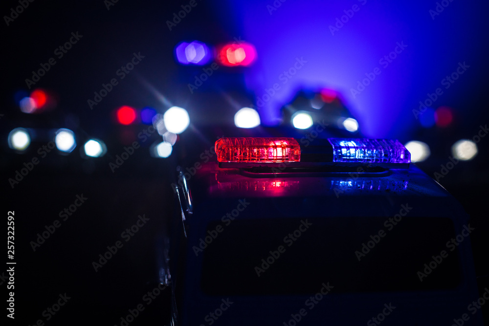 Police cars at night. Police car chasing a car at night with fog ...