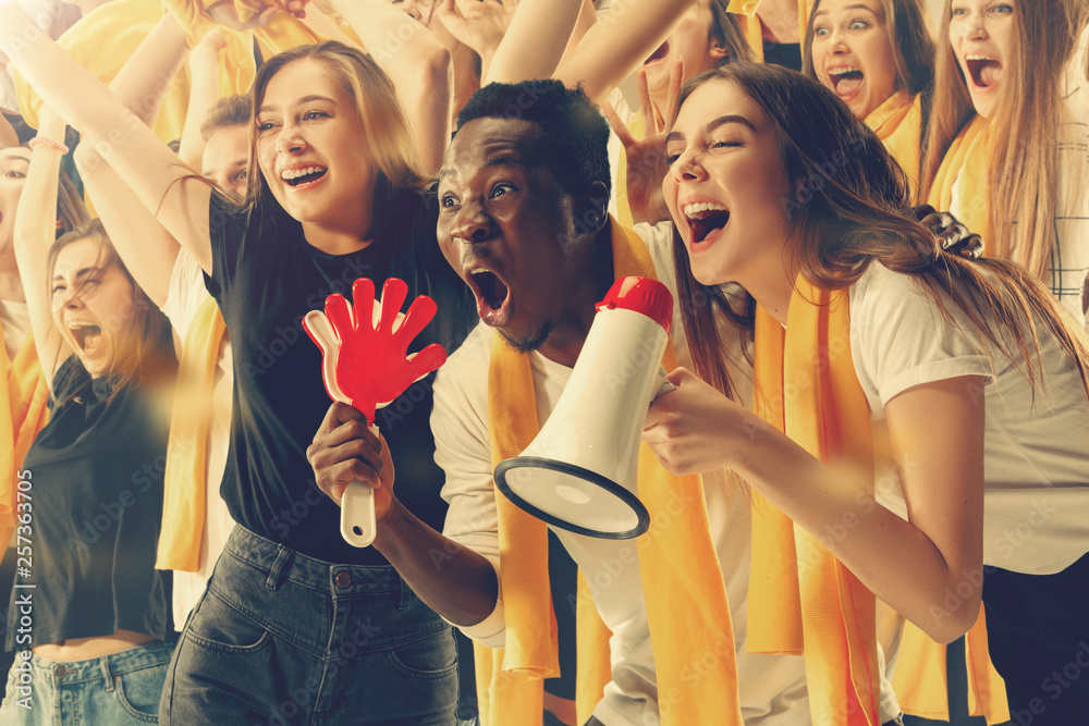 Group of happy fans are cheering for their team victory. Collage made ...