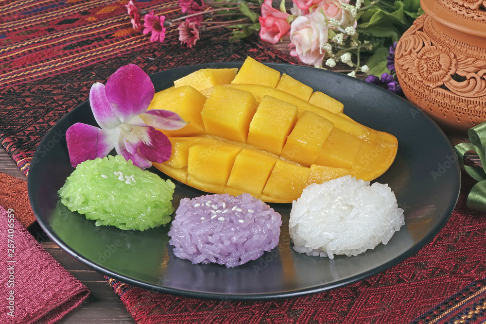 Mango sticky rice, famous Thai dessert. Fresh sliced mango served with ...