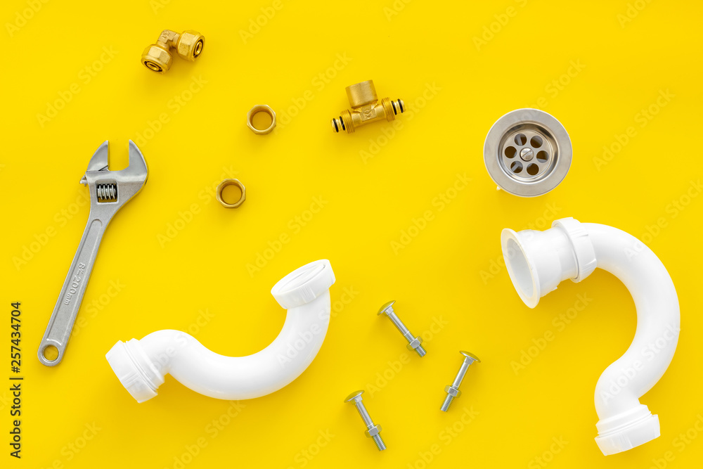 Plumber work with instruments, tools and gear on white background top ...