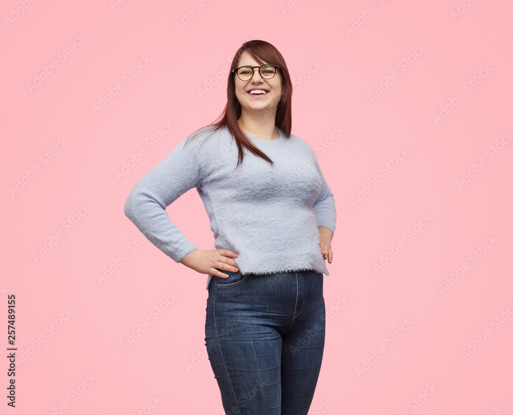 Laughing plumpy girl in glasses Stock Photo | Adobe Stock