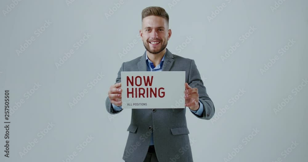 FIXED Handsome Caucasian HR manager wearing suit holding recruitment ...