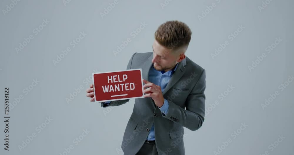 FIXED Handsome Caucasian HR manager wearing suit holding recruitment ...