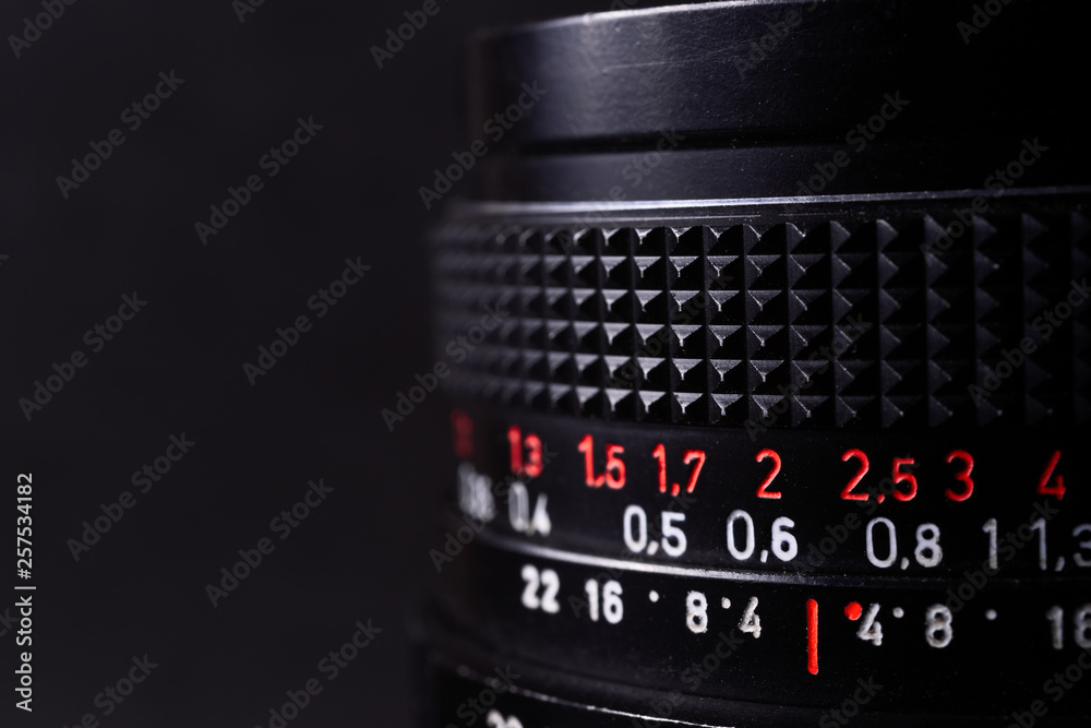 Vintage lens scales symbols closeup. Stock photo with blurred gray ...